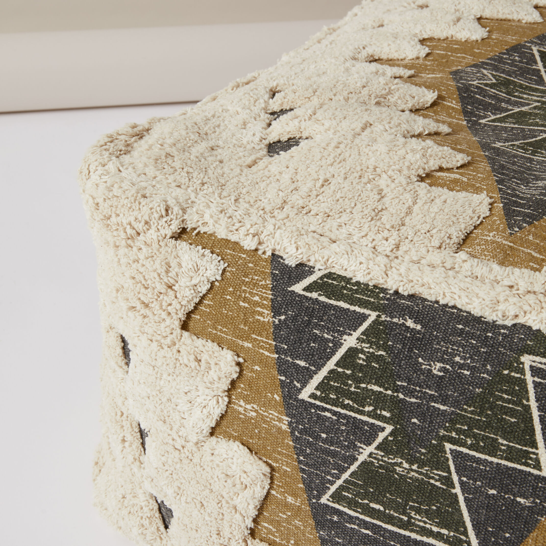 Tribal Geometric Patterned Footstool in Black & Gold | Inside Story