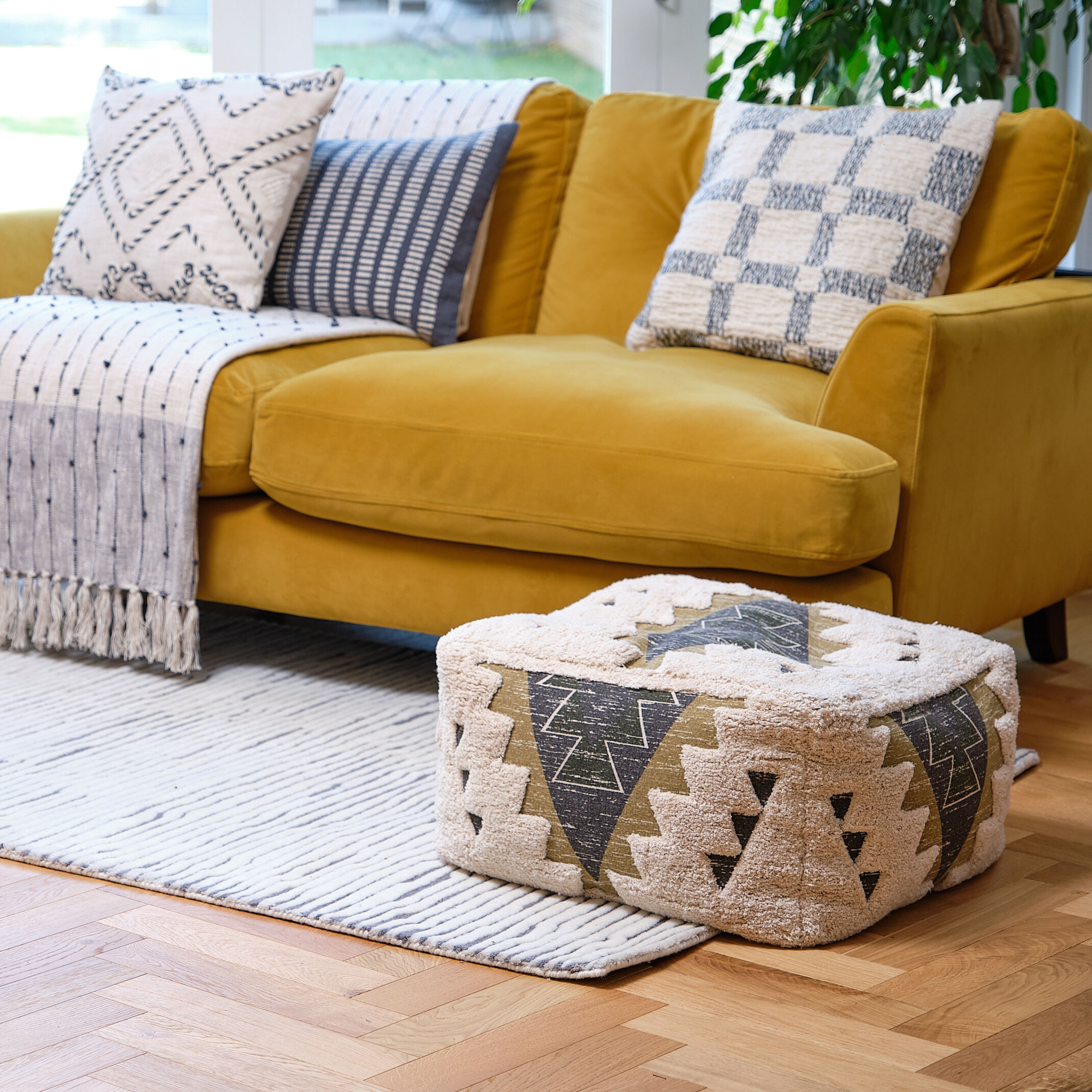Tribal Geometric Patterned Footstool in Black & Gold | Inside Story